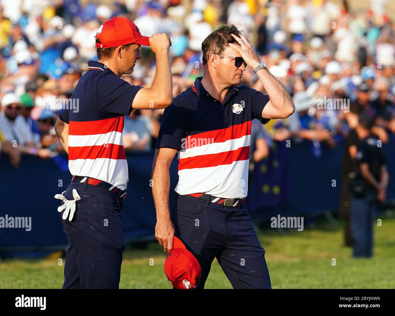 USA Captain Zach Johnson (right) stands dejected alongside Jordan ...