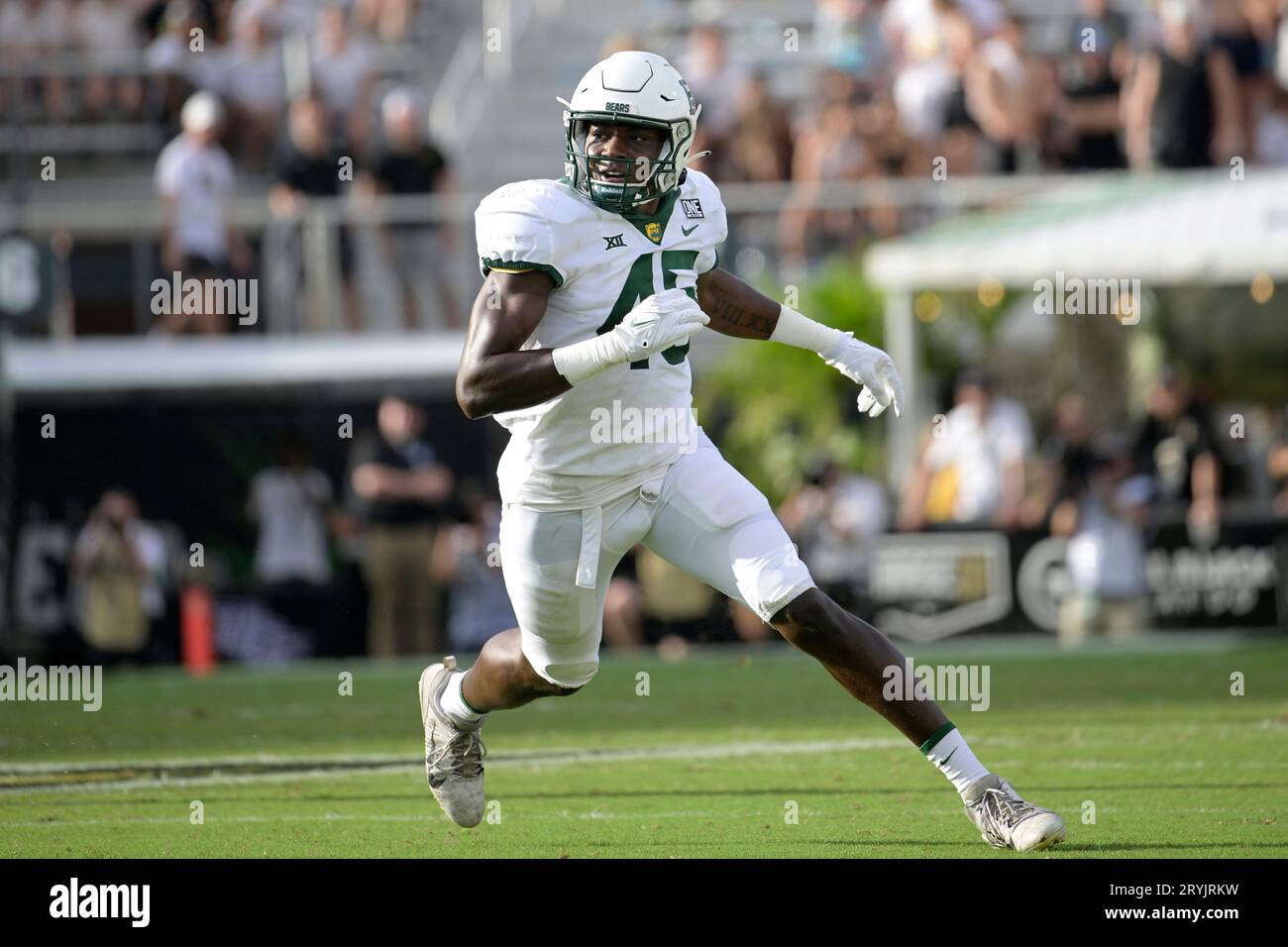 Baylor linebacker Byron Vaughns (45) follows a play during the second half of an NCAA football ...