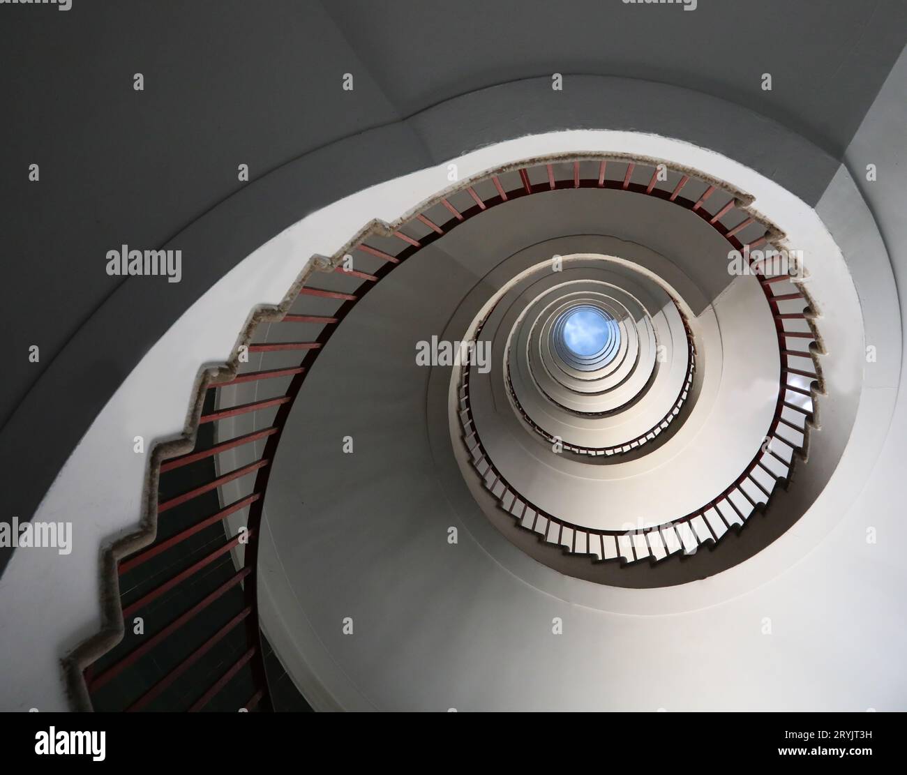 spiral staircase that goes up to the sky and you can see the azure blue ...