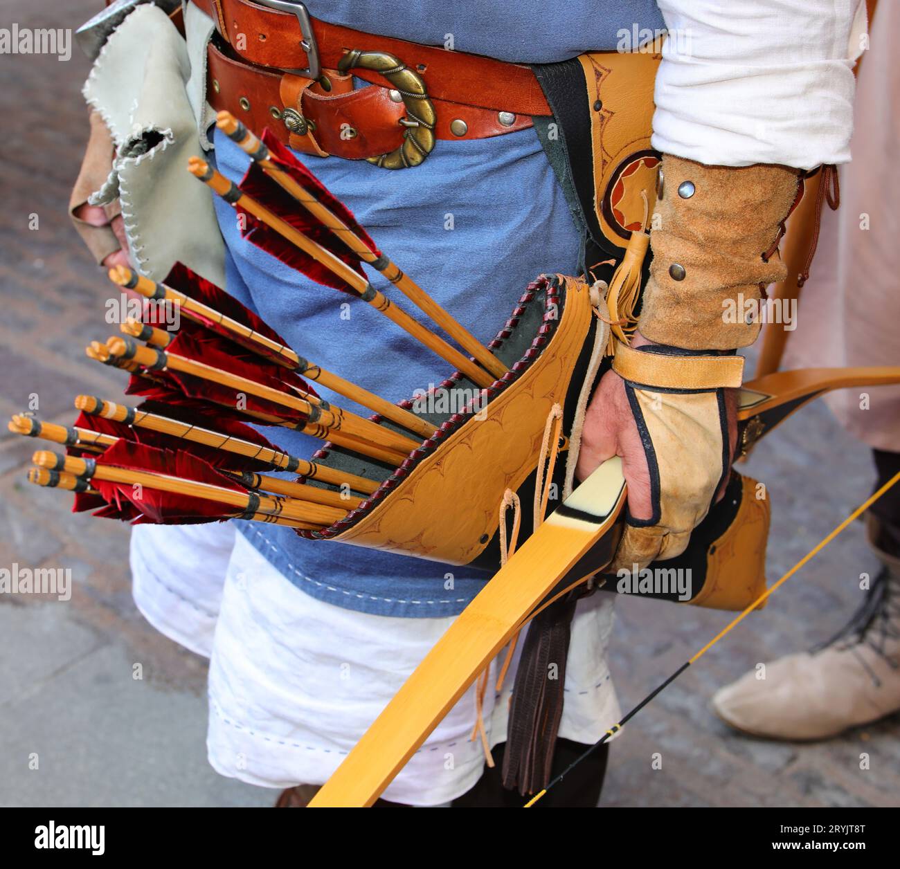 archer with leather quiver for arrows and medieval clothes during ...