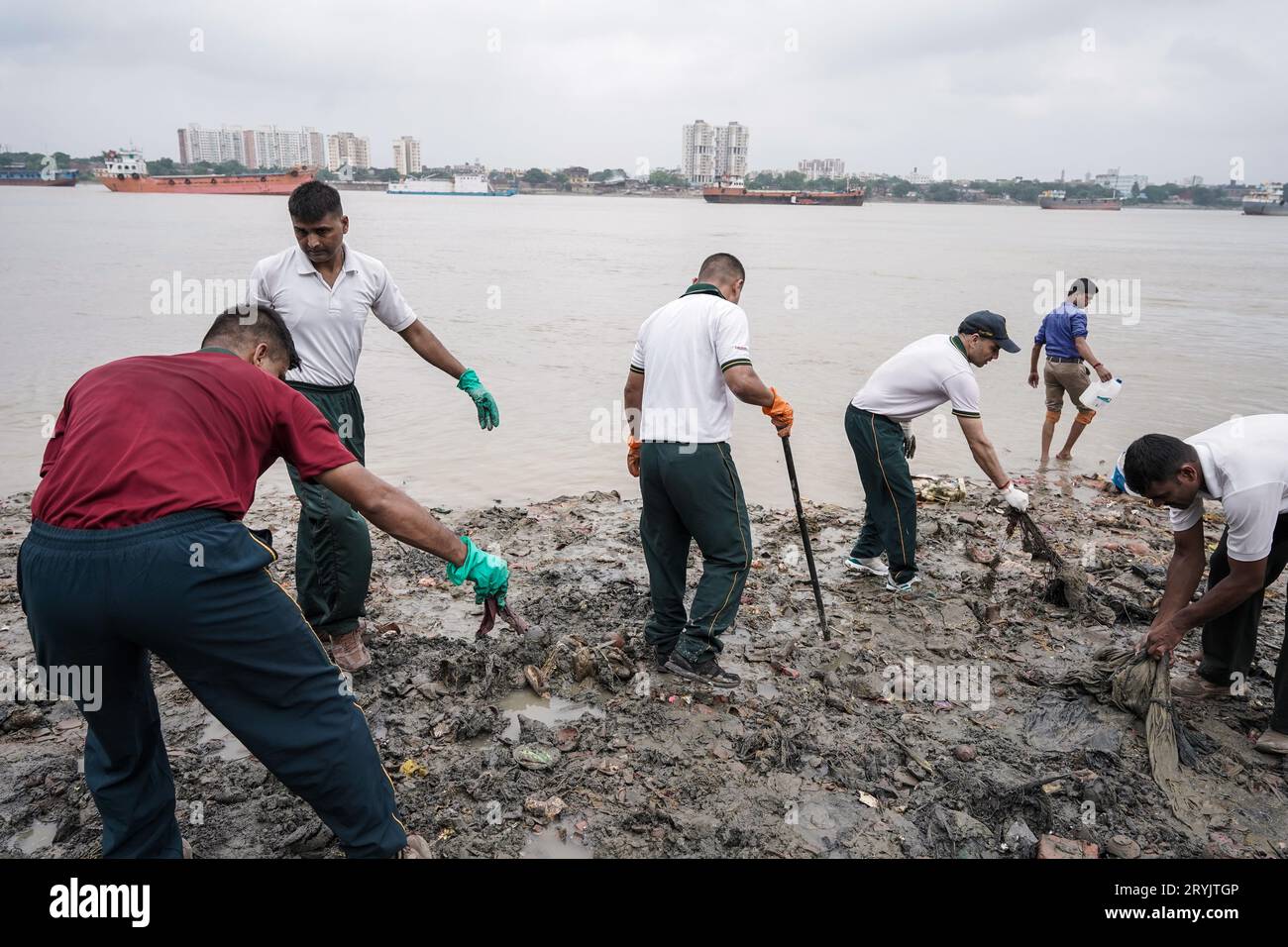 Army personnel of Gorkha Regiment clean the garbage on the bank of the ...
