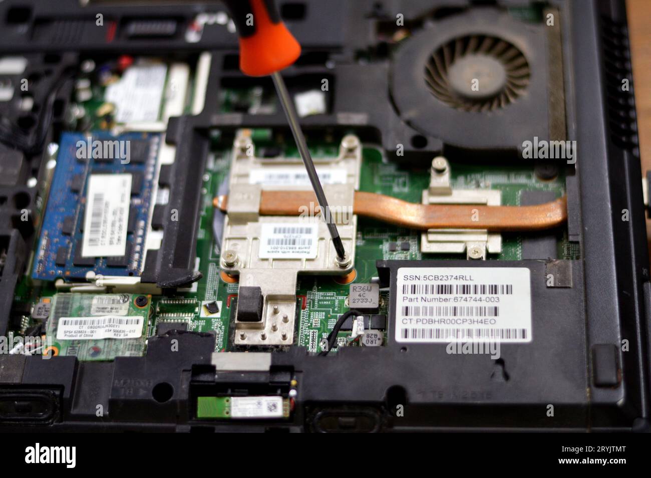 Cairo, Egypt, September 5 2023: maintenance of a laptop, fixing a problem in a computer hardware ...