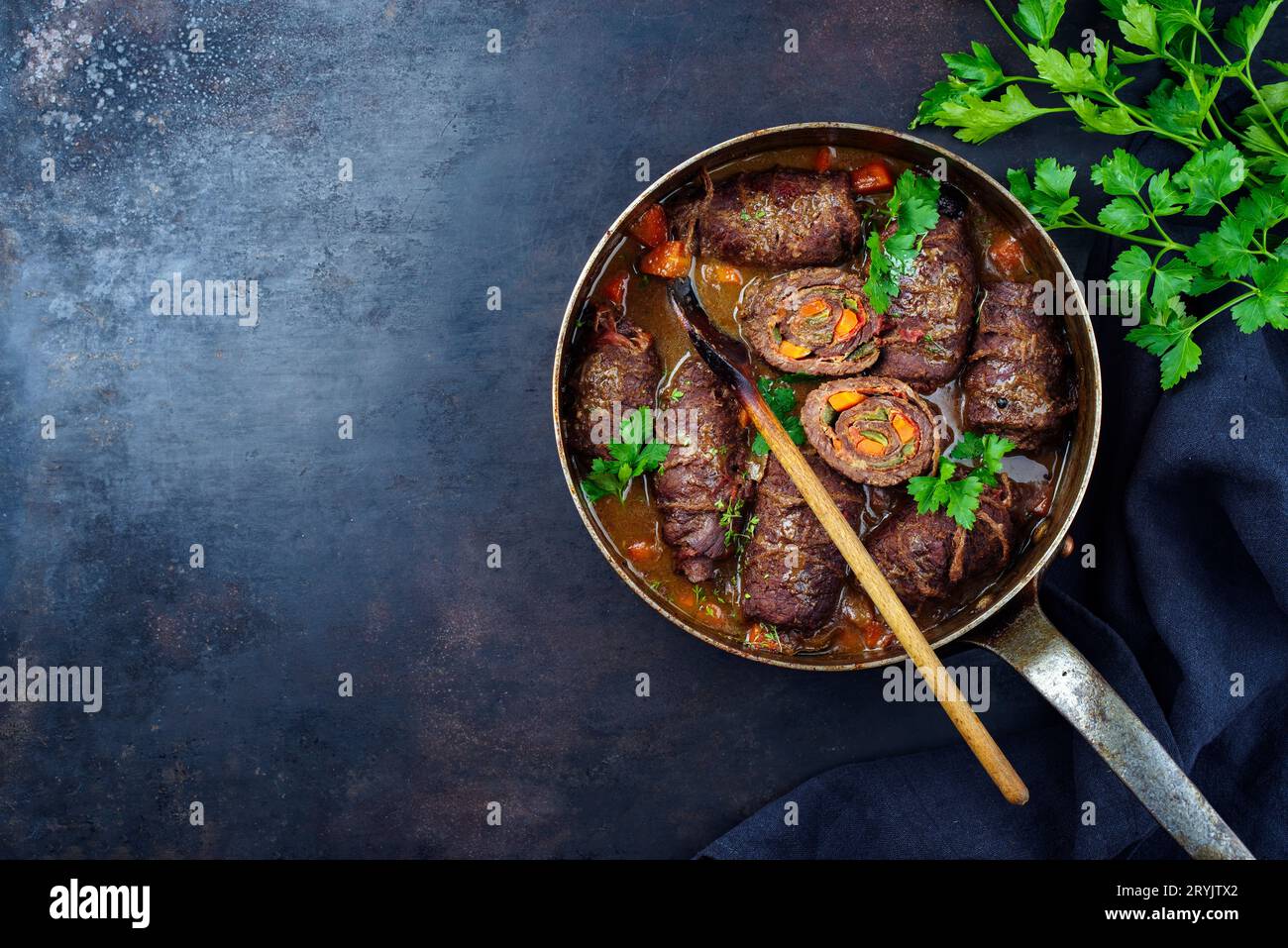 Traditional slow cooked German wagyu beef roulades with vegetable and ...