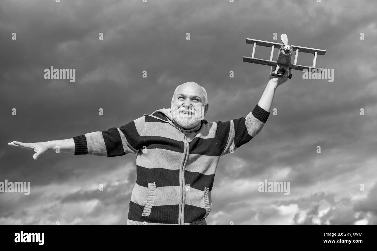 happy retirement. retired pensioner with toy. retired old man outdoor ...