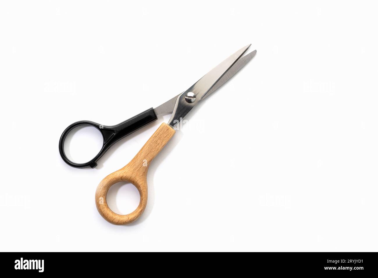 Scissors with a plastic handle that has been replaced by a self-made ...