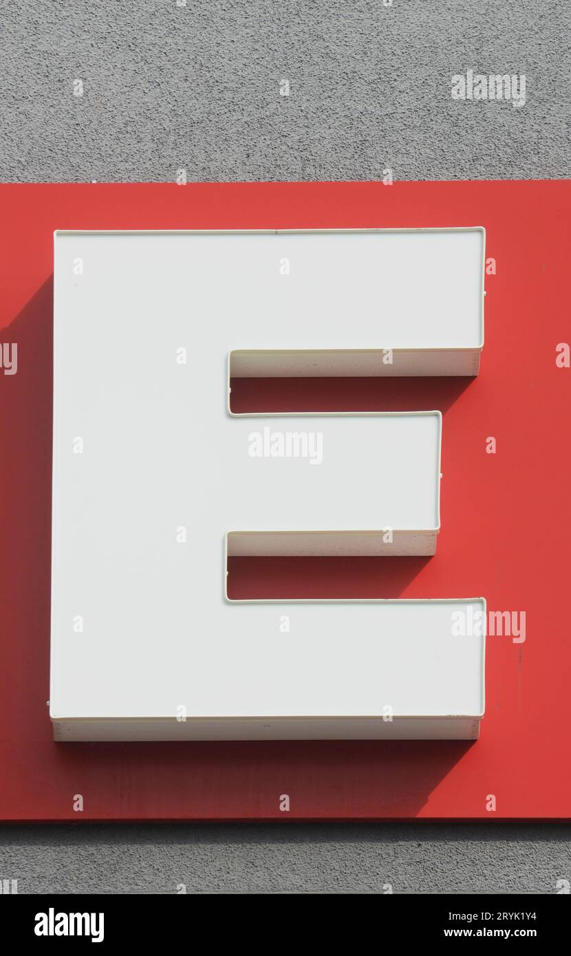 Raised letter E white on red background, adding depth, style & meanng ...
