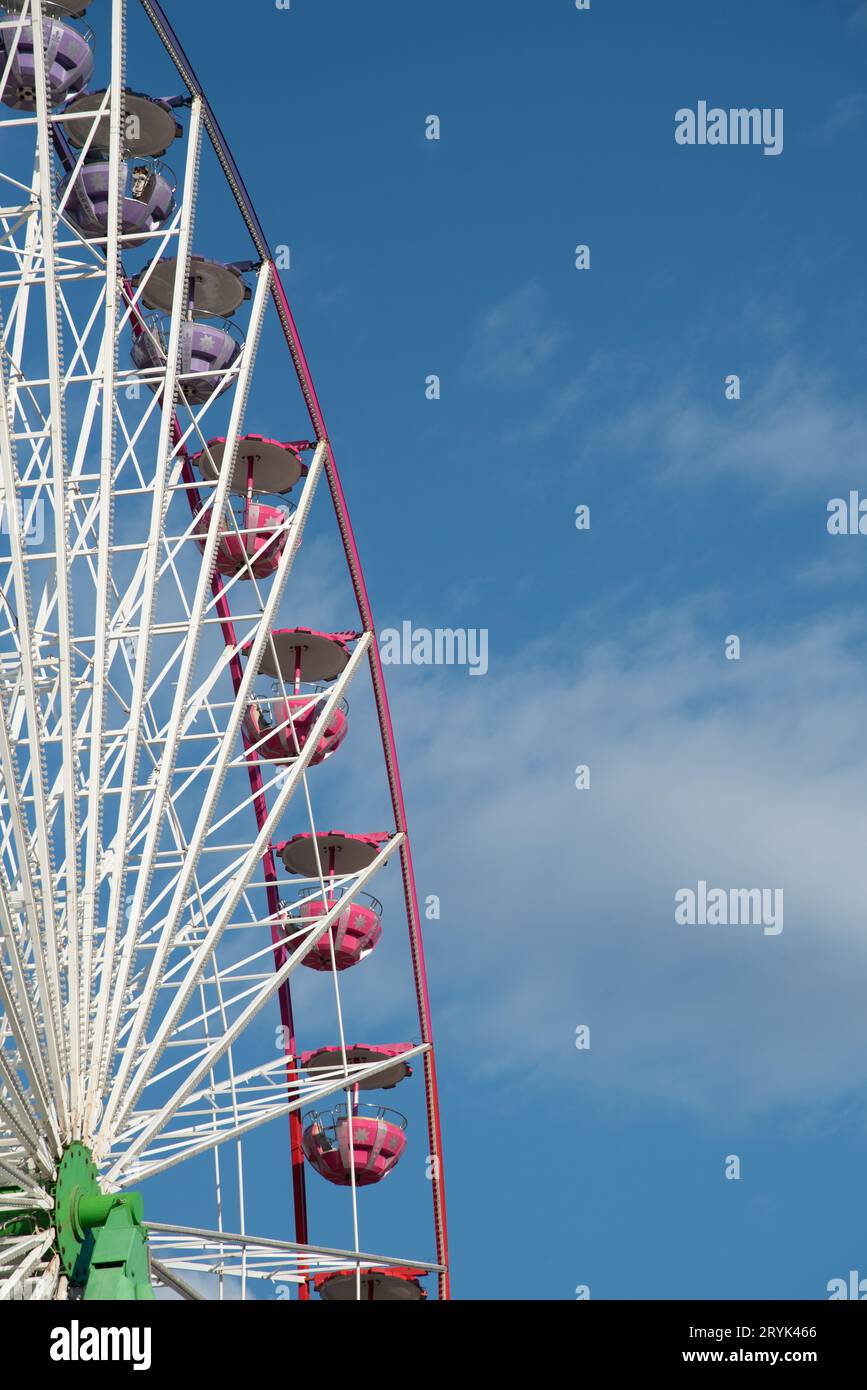 Multicolour ferris wheel isolated on blue sky background, Having fun on ...