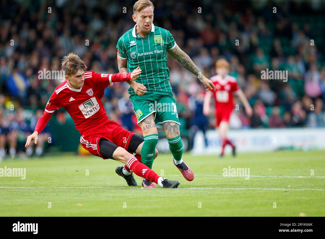 Jordan Maguire-Drew of Yeovil Town and Cameron McNeil of Didcot Town ...