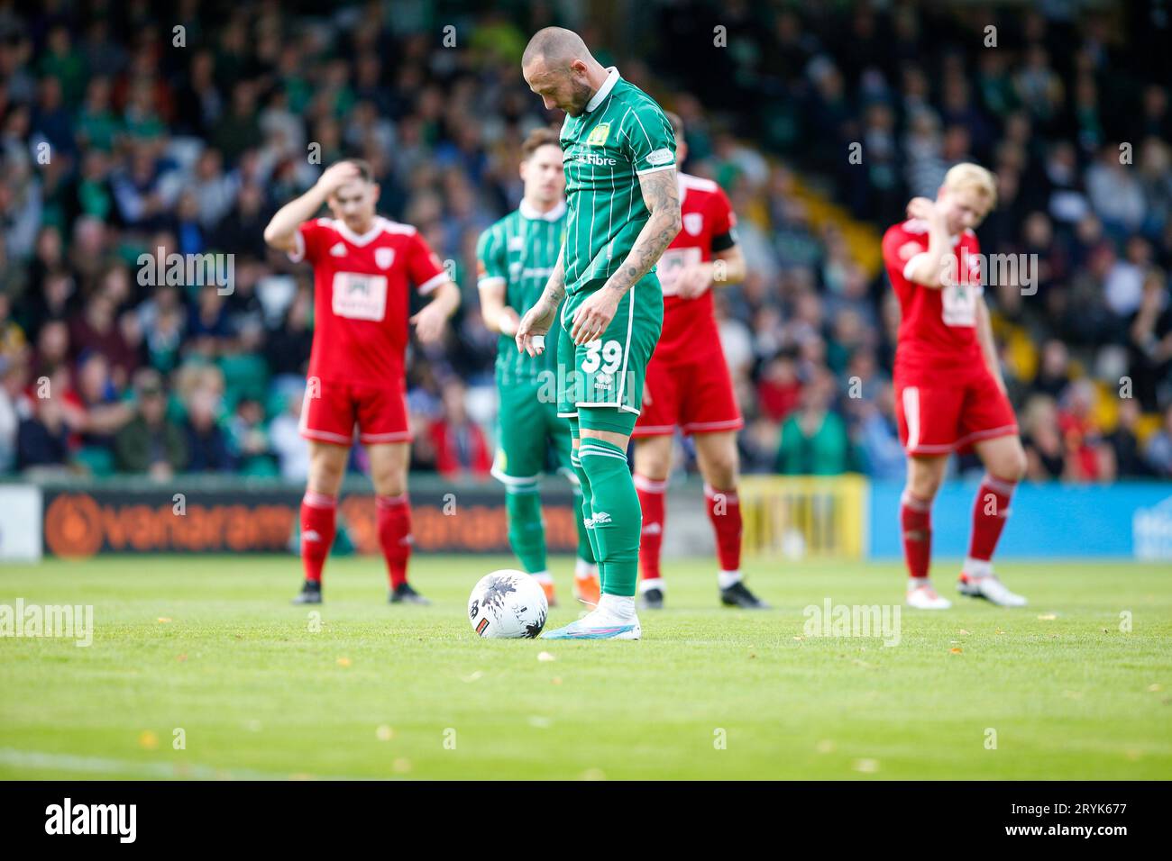 Jordan Maguire-Drew of Yeovil Town and Cameron McNeil of Didcot Town ...