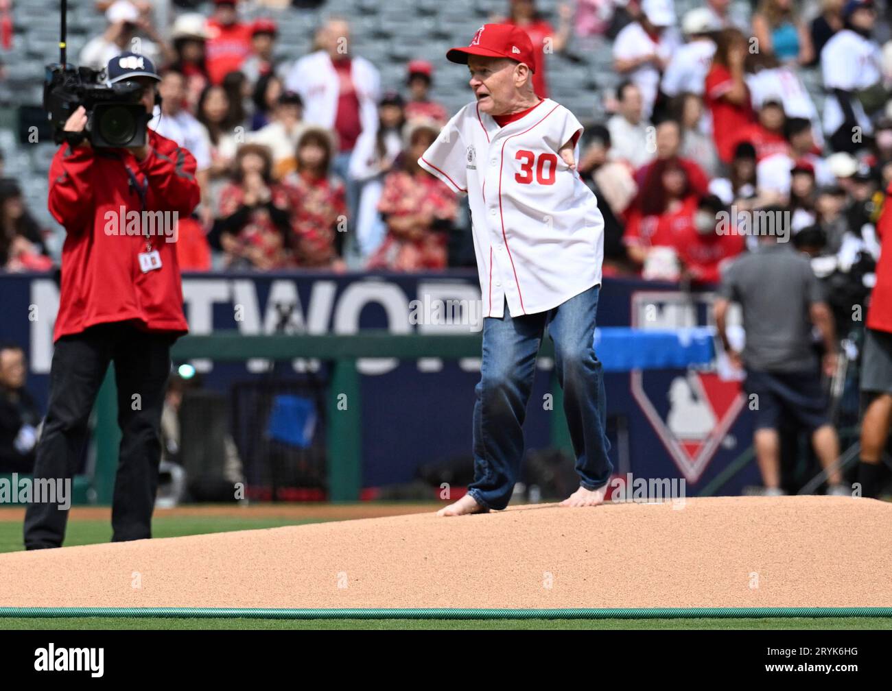 Tom Willis, of Mira Mesa California, throws out the ceremonial first ...