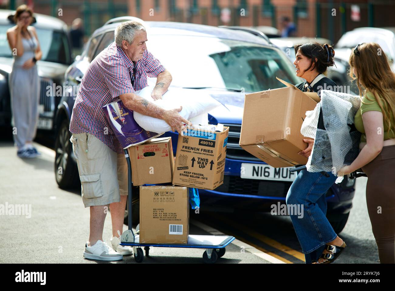 Liverpool students moving into student accommodation Stock Photo - Alamy