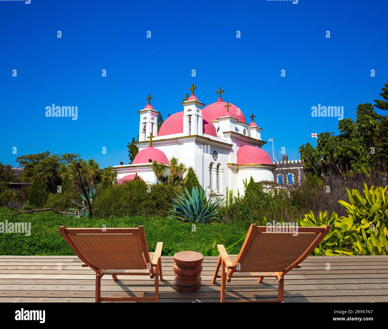 Two comfortable wooden lounge chairs Stock Photo - Alamy