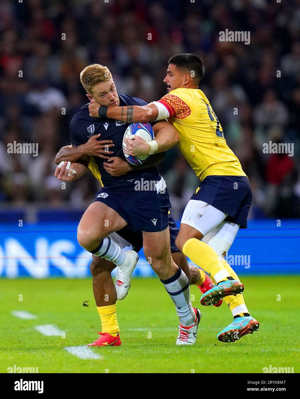 Scotland's Kyle Steyn is tackled by Romania's Tudor Boldor during the ...