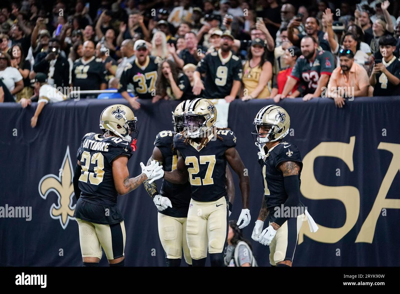New Orleans Saints cornerback Isaac Yiadom (27) is congratulated by ...