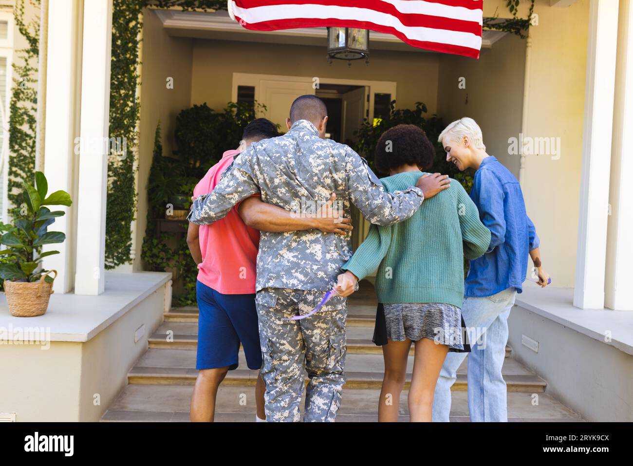 Young adult friends greeting usa hi-res stock photography and images ...