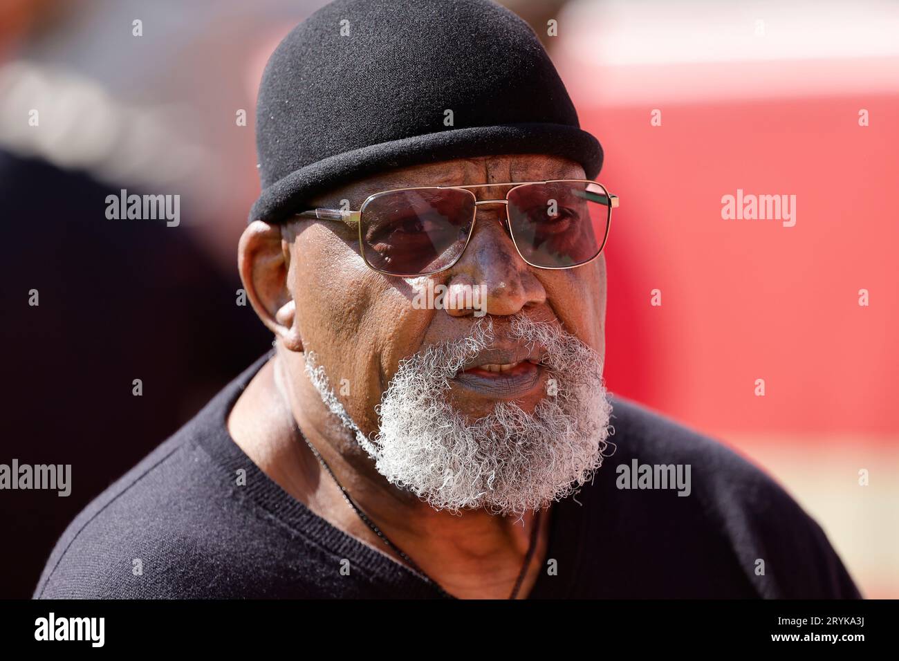 Dr. Harry Edwards is shown on the field before an NFL football game ...