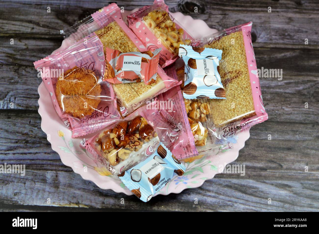 Cairo, Egypt, September 27 2023: Despacito Patisserie collection of Eastern candy Noga, peanuts ...