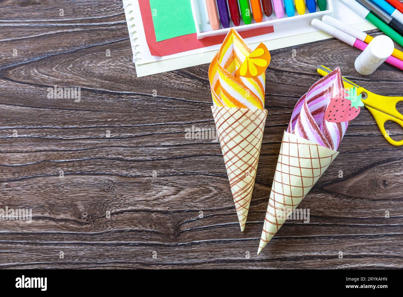 Paper Fan paper ice cream on a wooden table. Childrens art summer ...