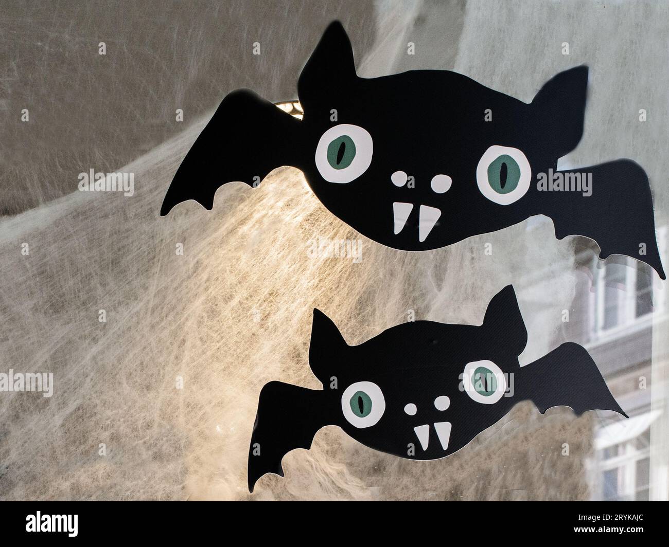 Cute halloween design with bats and spider web. Background Stock Photo ...