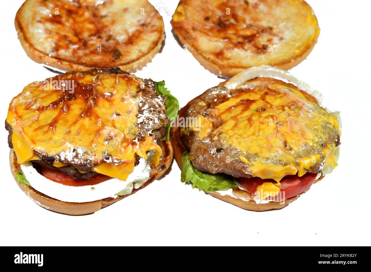 A juicy thick double beef patty with cheese covered with sauce, crispy ...