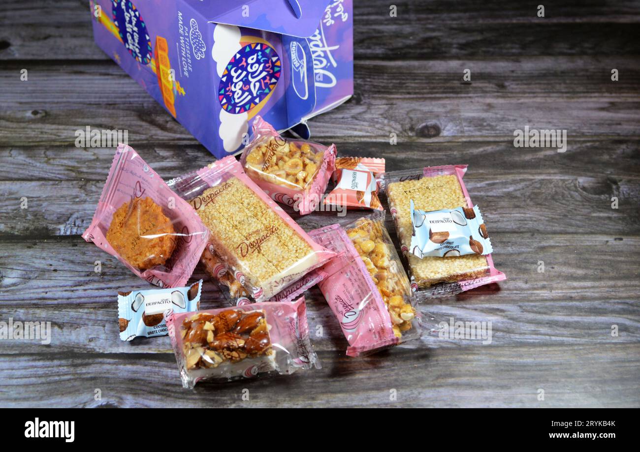 Cairo, Egypt, September 27 2023: Despacito Patisserie collection of Eastern candy Noga, peanuts ...