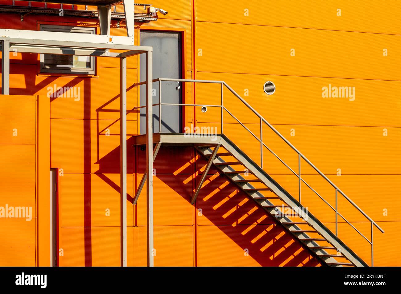 Fire escape ladder or emergency exit with steel staircase Stock Photo ...