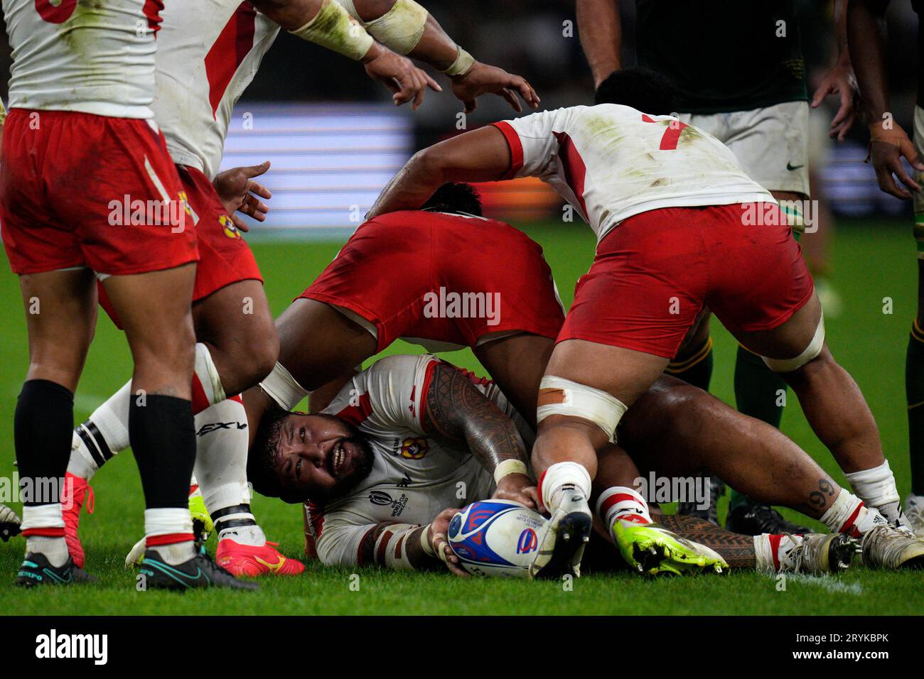 Tonga's Ben Tameifuna passes the ball during the Rugby World Cup Pool B ...