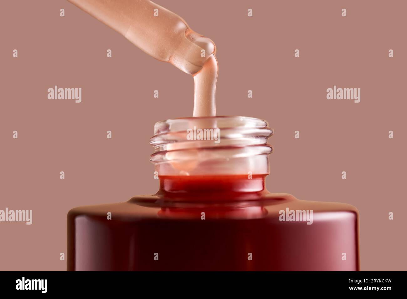 Dropper pink liquid hi-res stock photography and images - Alamy