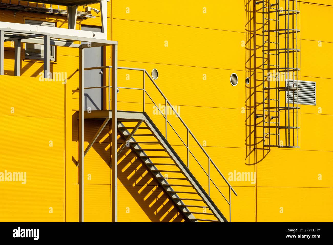 Fire escape stairs mounted to the outside Stock Photo - Alamy