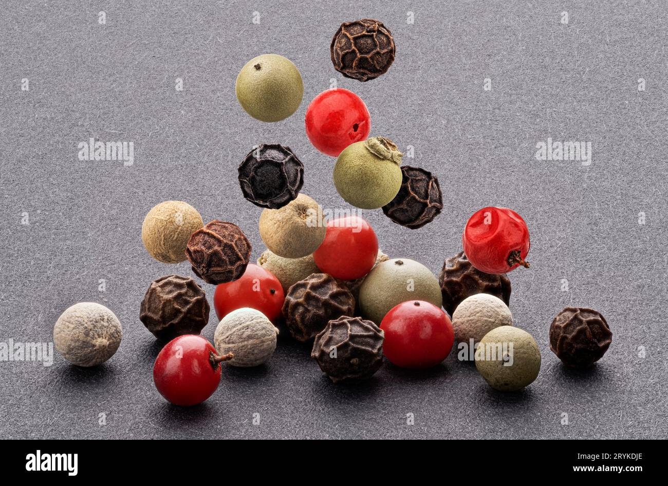 Falling black pepper peppercorn hi-res stock photography and images - Alamy