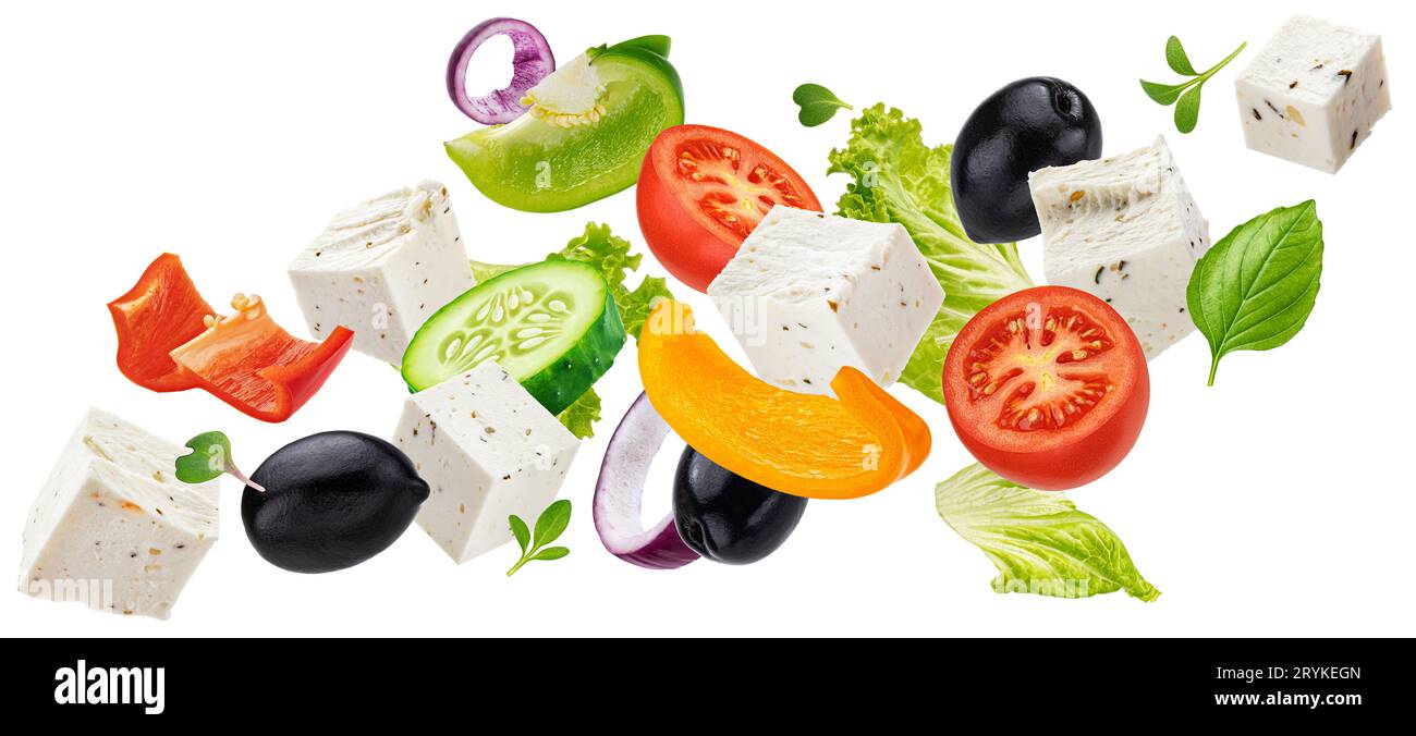 Falling greek salad isolated on white background Stock Photo - Alamy