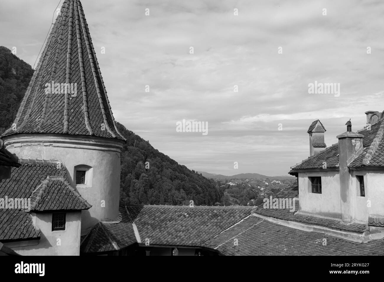 Black and white window view of the Bran Castle fortress inner yard ...