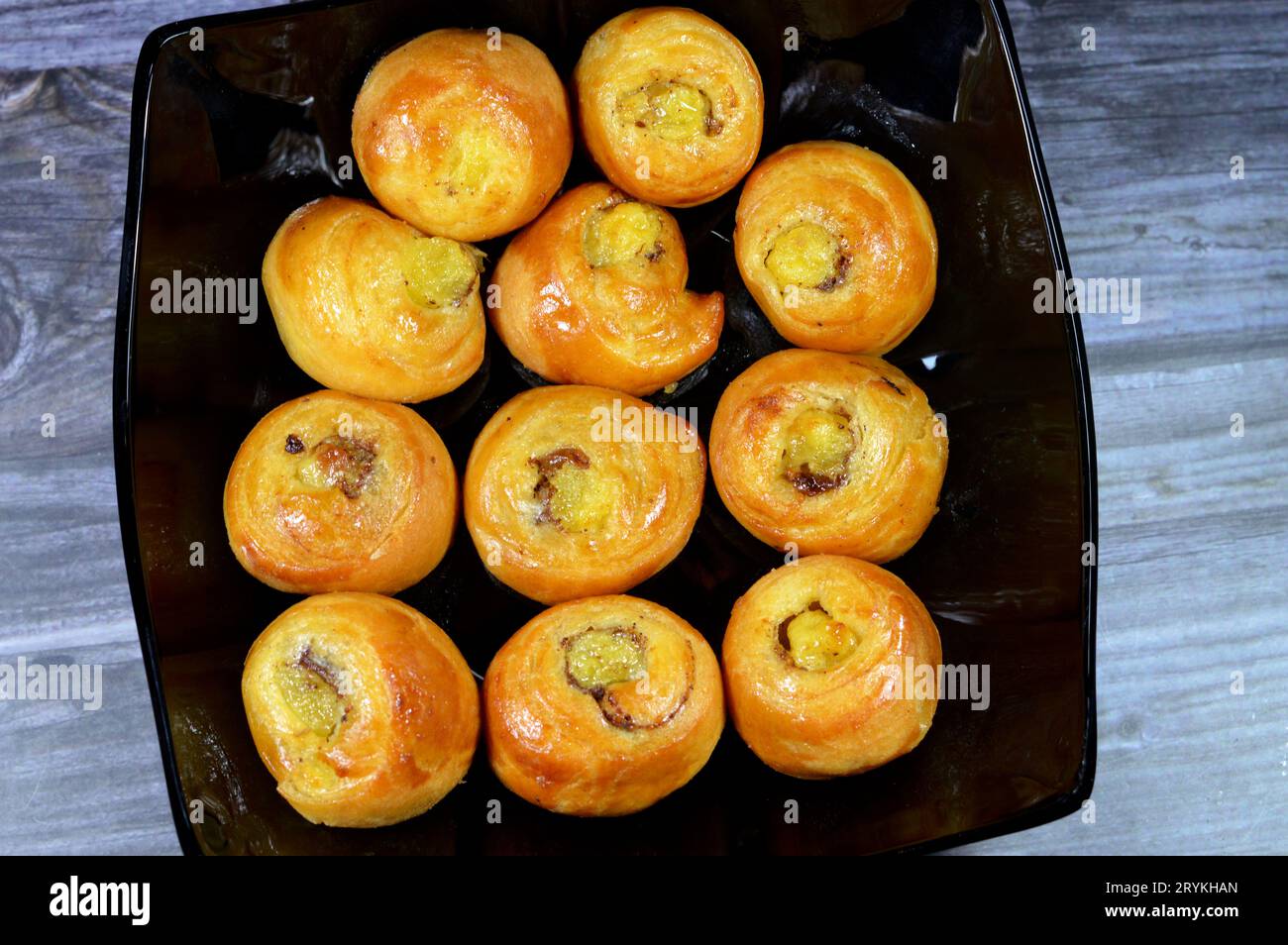 Mini Cinnamon swirl puff roll sweetened with honey and raisins and ...