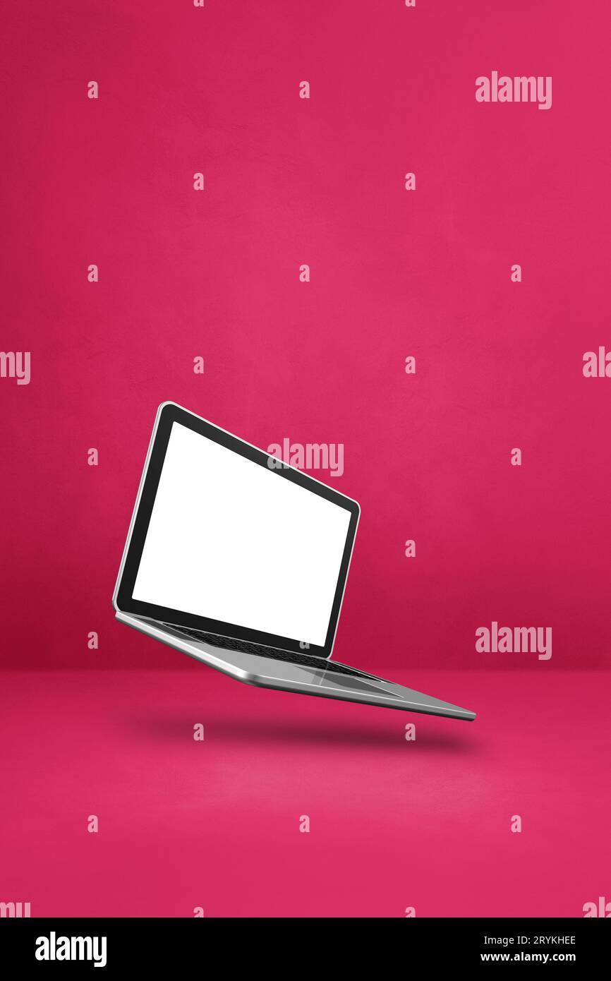 Floating computer laptop isolated on pink. Vertical background Stock ...