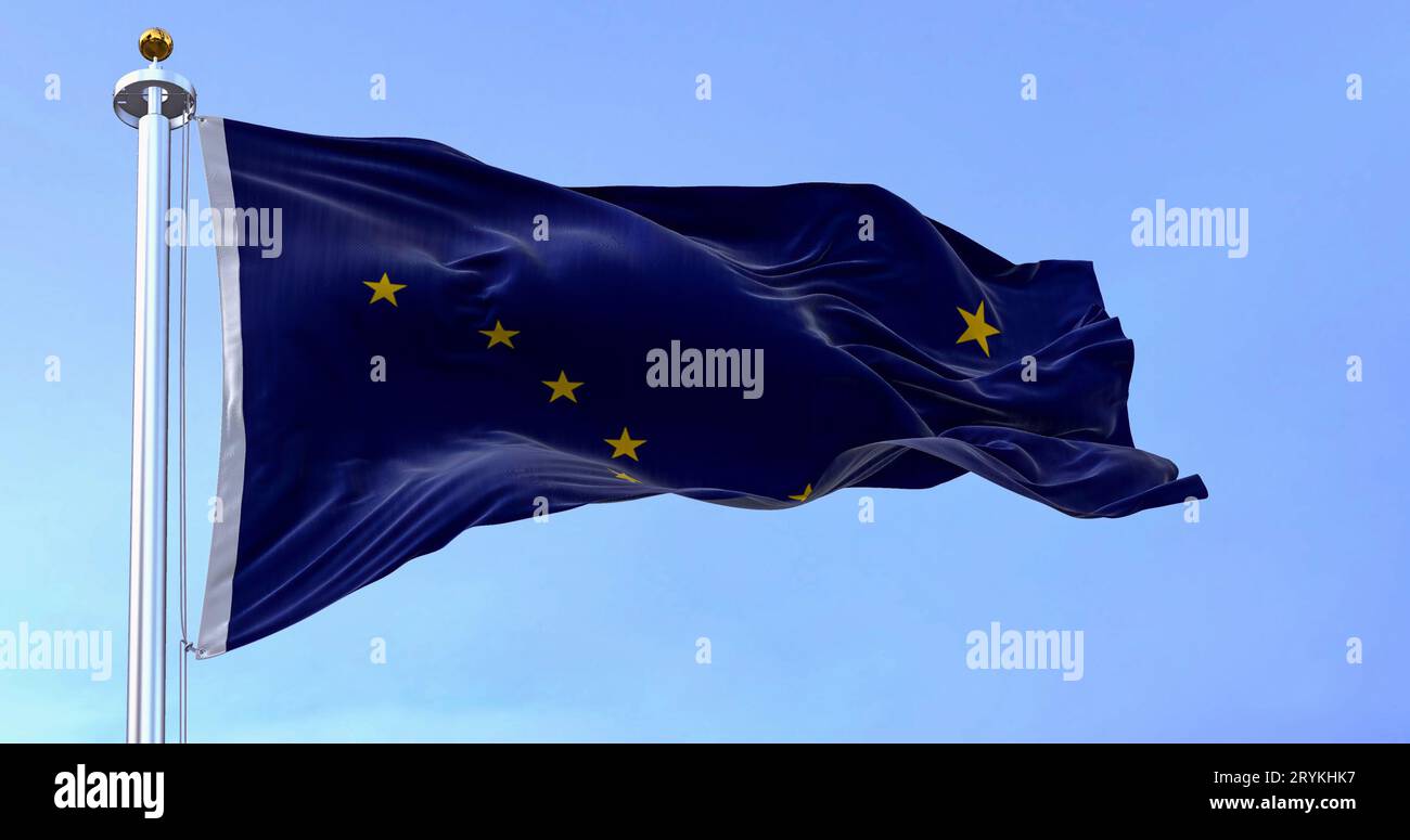 Alaska state flag waving in the wind on a clear day. Big dipper and ...
