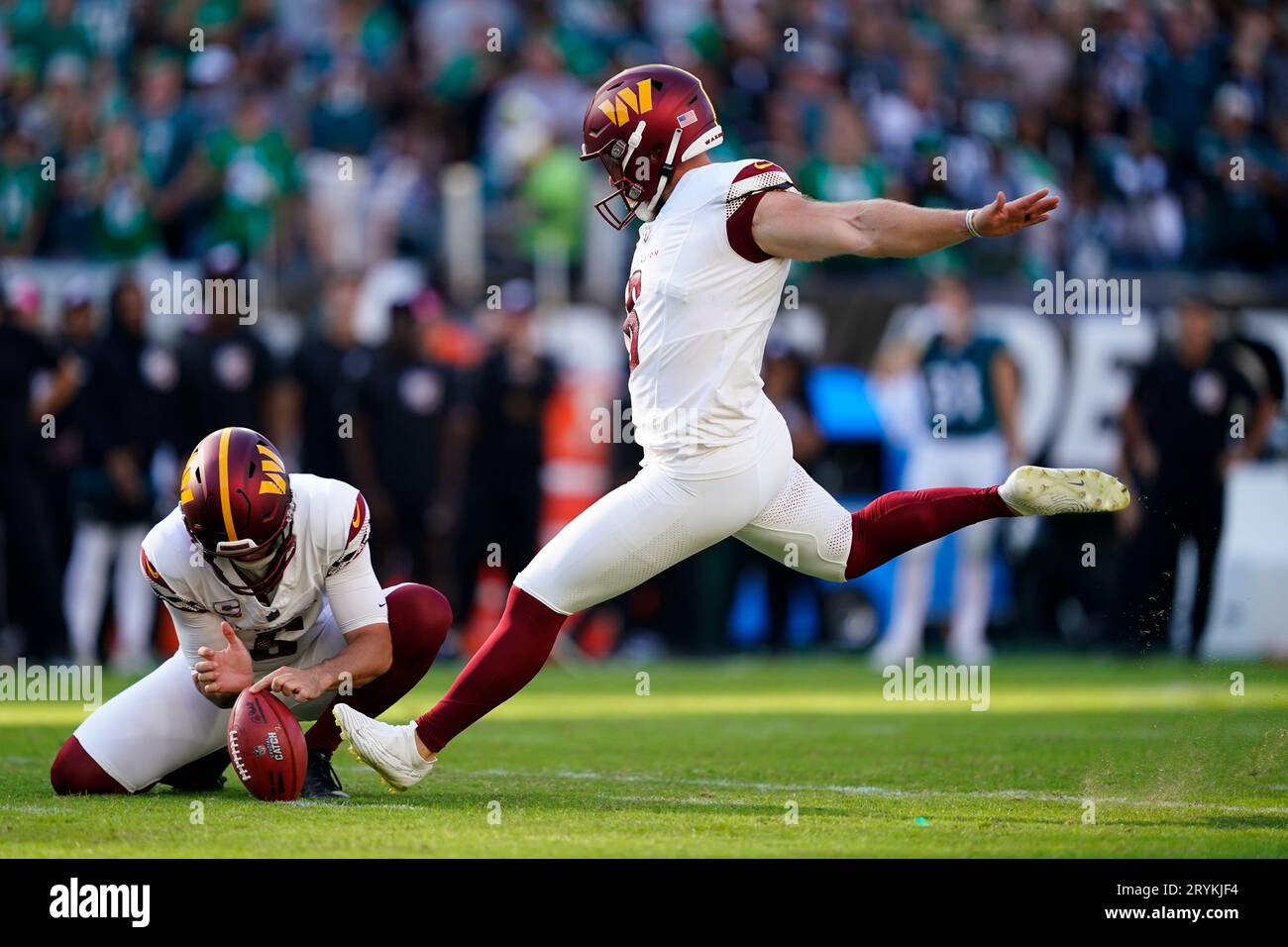 Washington Commanders place kicker Joey Slye (6) kicks an extra point ...