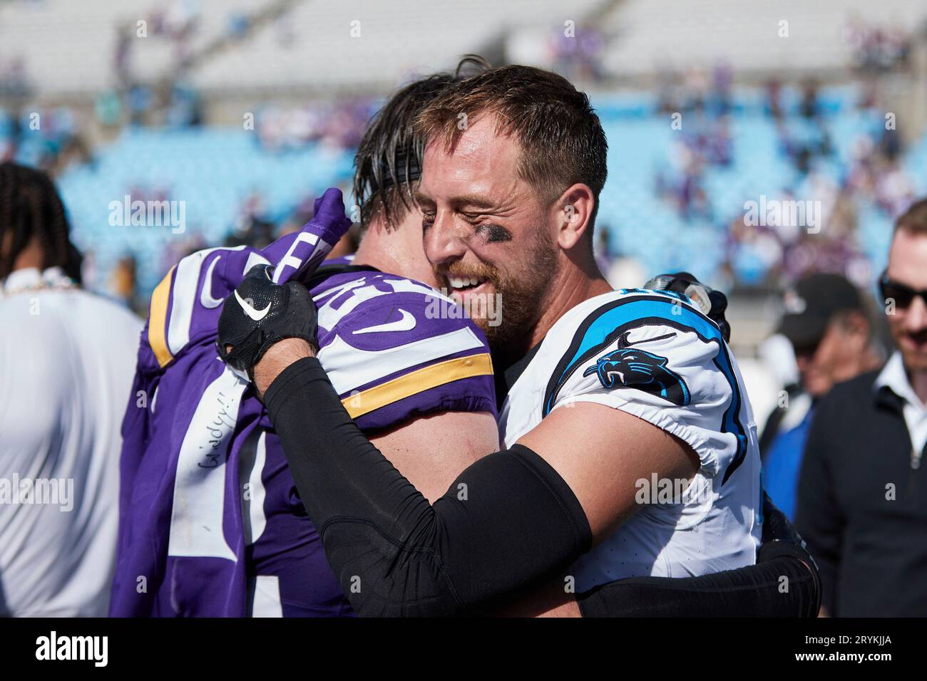 Carolina Panthers wide receiver Adam Thielen (19) hugs former teammate ...
