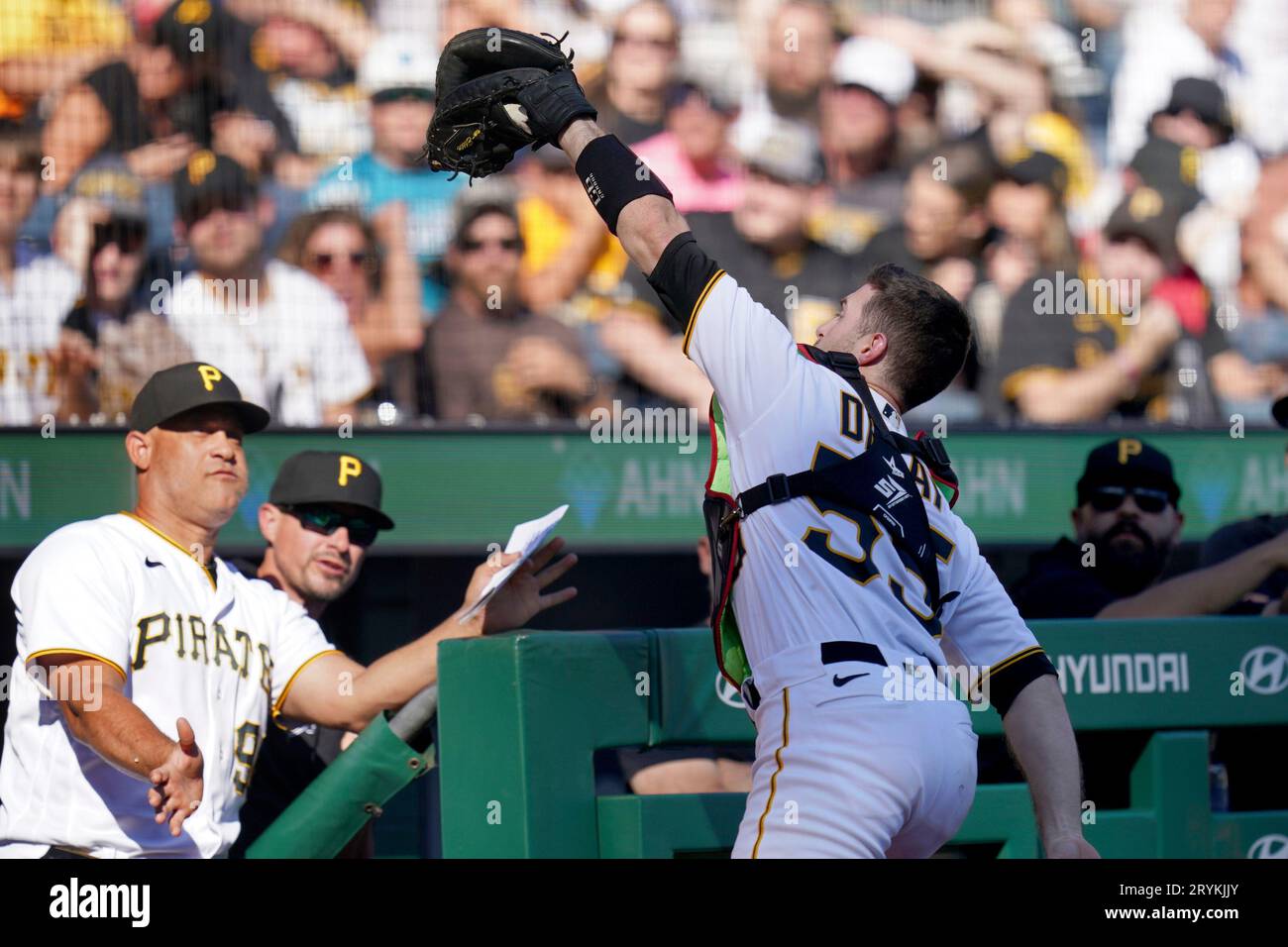 Pittsburgh Pirates catcher Jason Delay pulls in a foul ball hit by ...