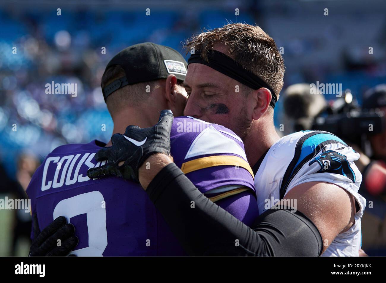 Minnesota Vikings quarterback Kirk Cousins (8) gets a hug from former ...