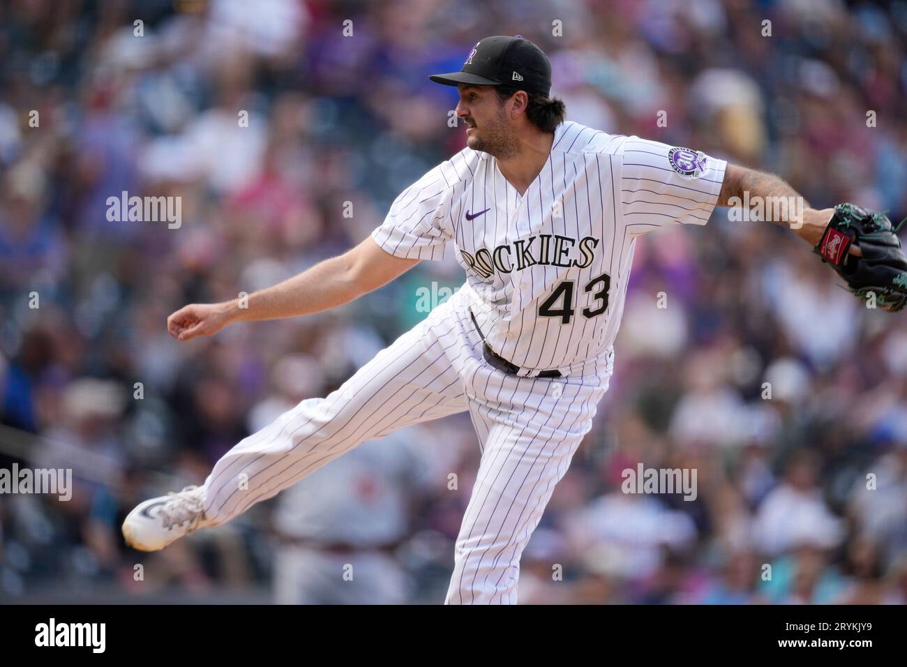 Colorado Rockies relief pitcher Connor Seabold works against the ...