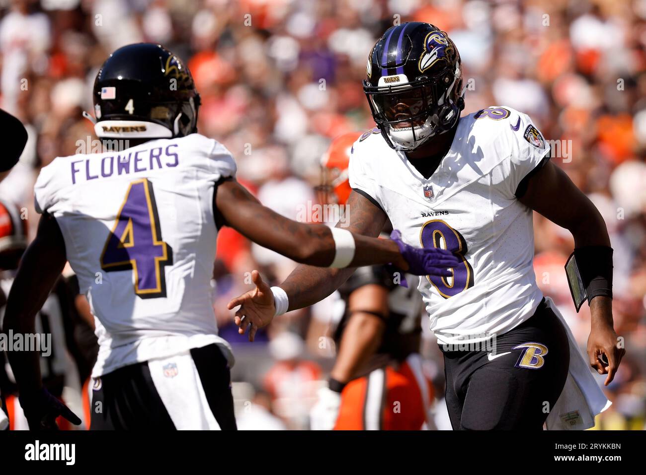 Baltimore Ravens quarterback Lamar Jackson (8) is congratulated by wide receiver Zay Flowers (4 ...
