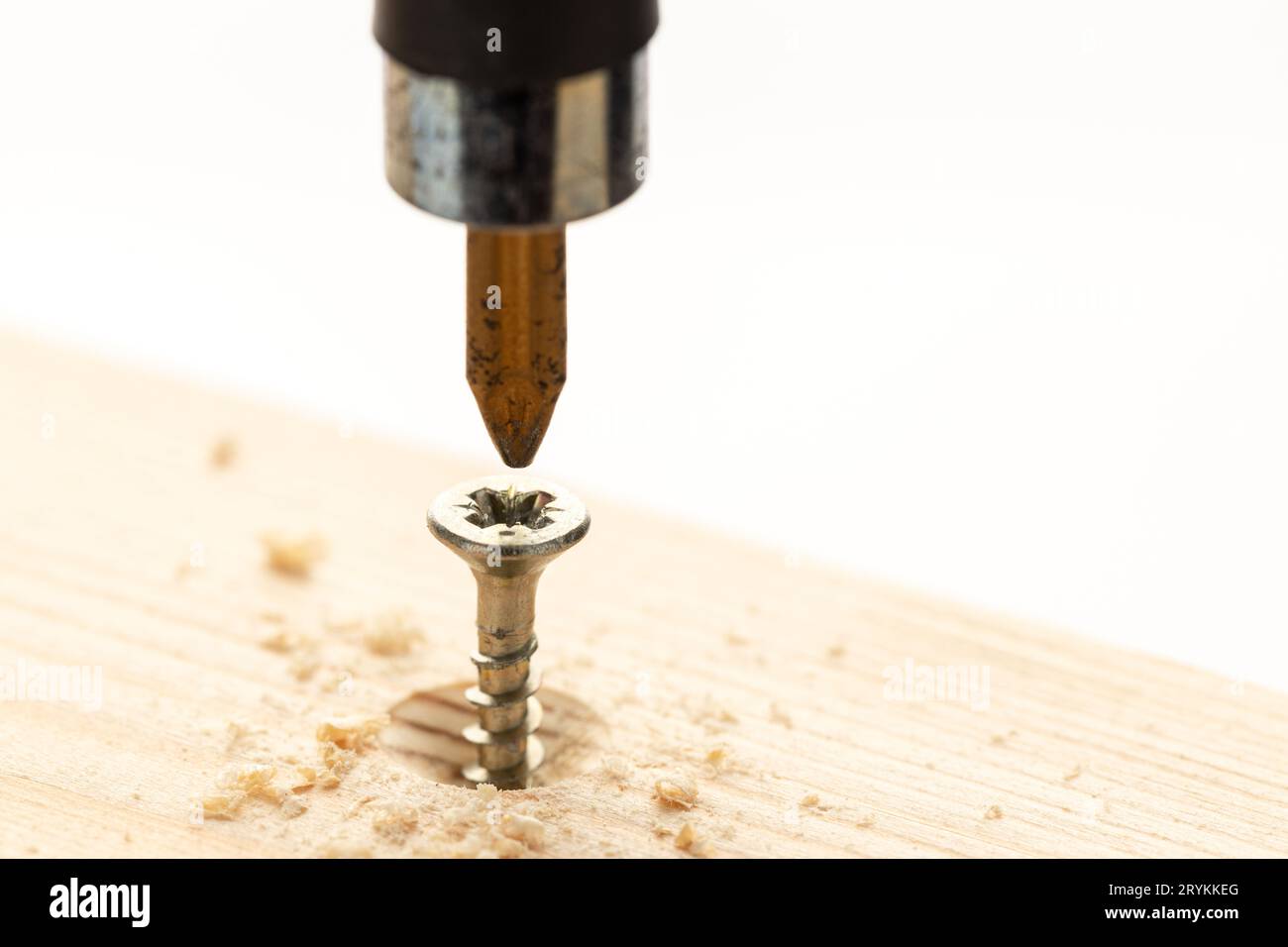Screwing screw into wooden plank hi-res stock photography and images ...