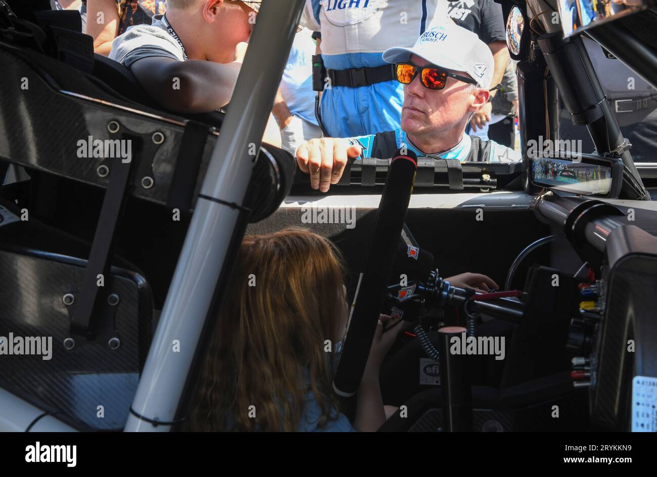 Driver Kevin Harvick visits with his children Keeland, left and Piper ...
