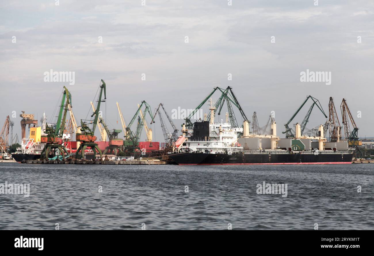 Industrial cargo ship loading. Varna port, Bulgaria Stock Photo - Alamy
