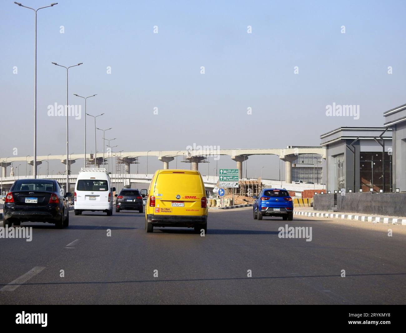 Cairo, Egypt, August 31 2023: DHL truck on its way delivering a package ...