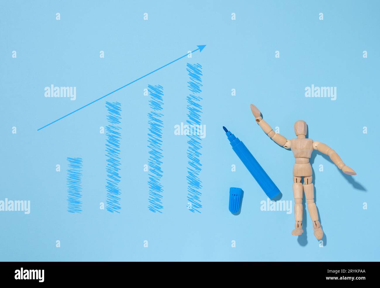 Wooden mannequin and graph with growing indicators, high income. Pink ...