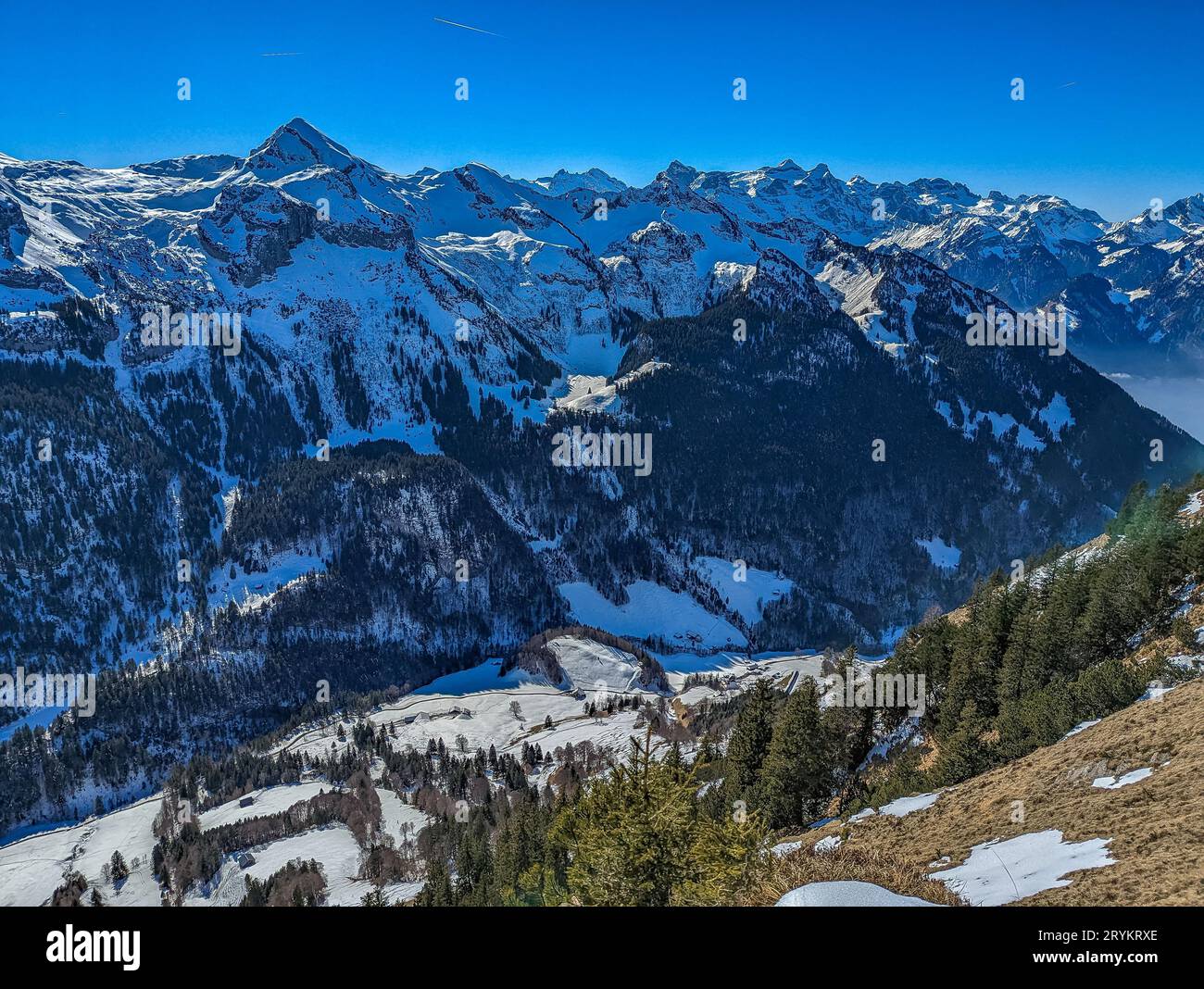 Aerial drone view of snow covered mountains and ski slopes, ski area ...