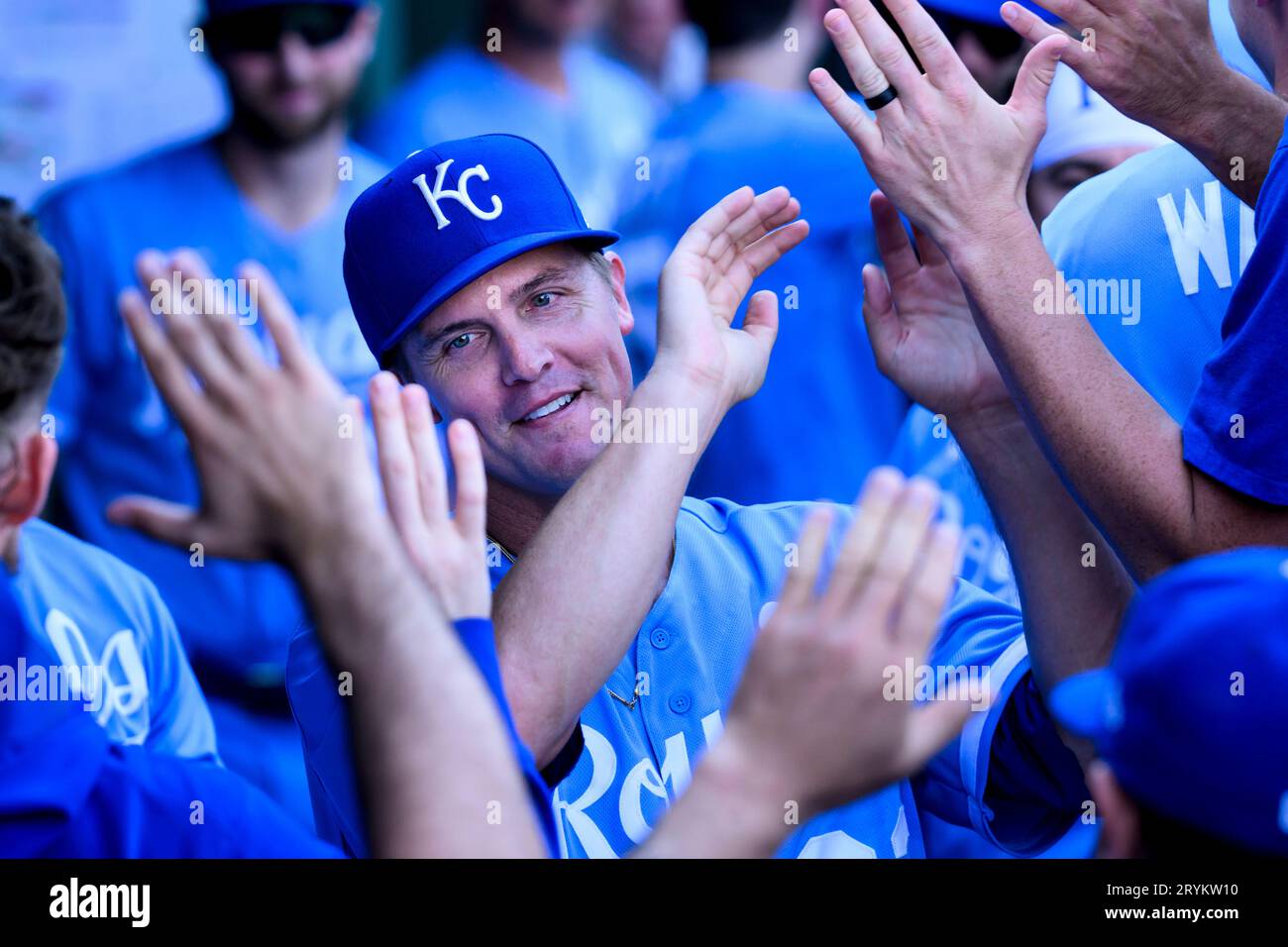 Kansas City Royals starting pitcher Zack Greinke is congratulated by ...