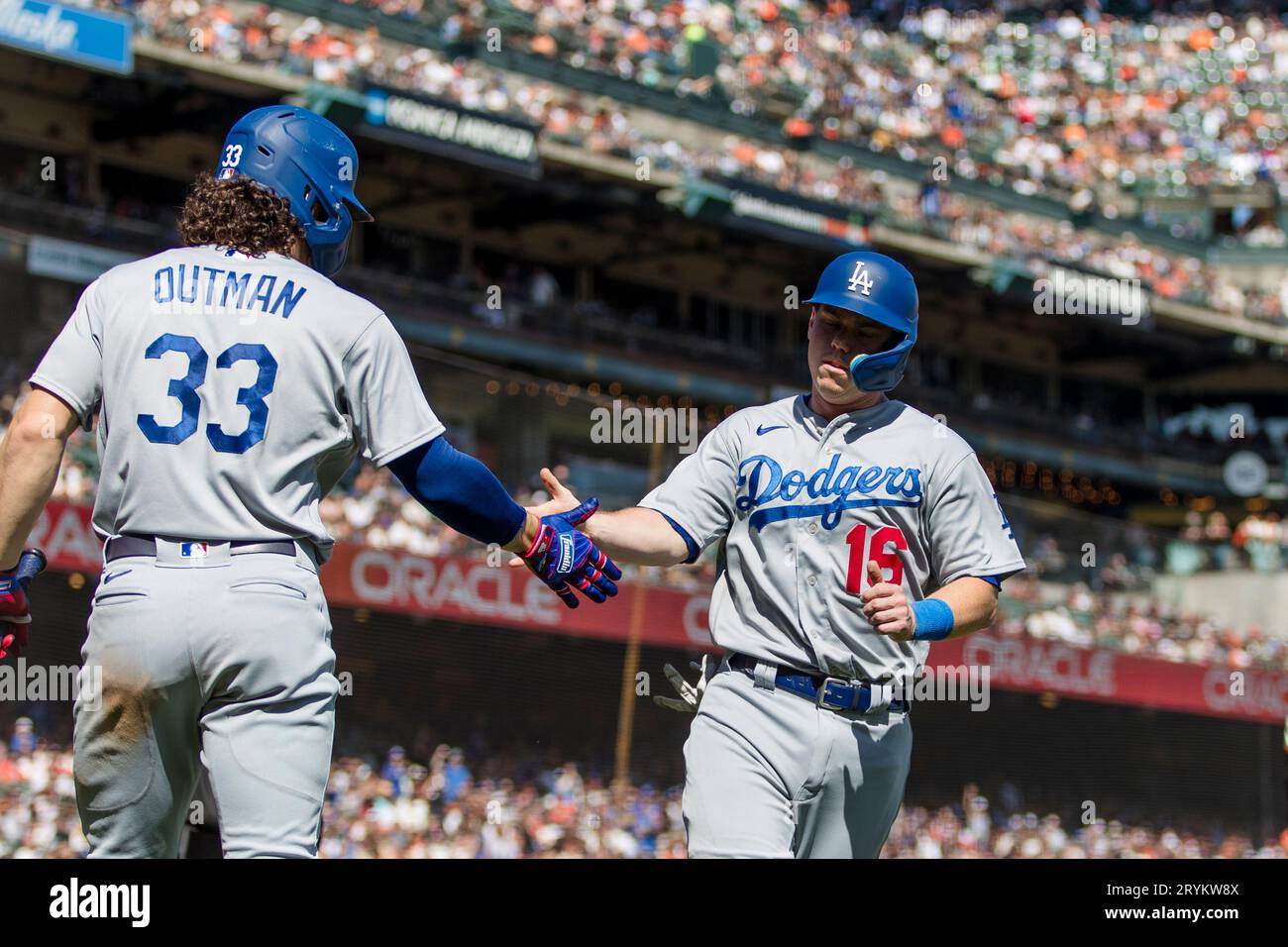 Los Angeles Dodgers' Will Smith (16) is congratulated by center fielder ...