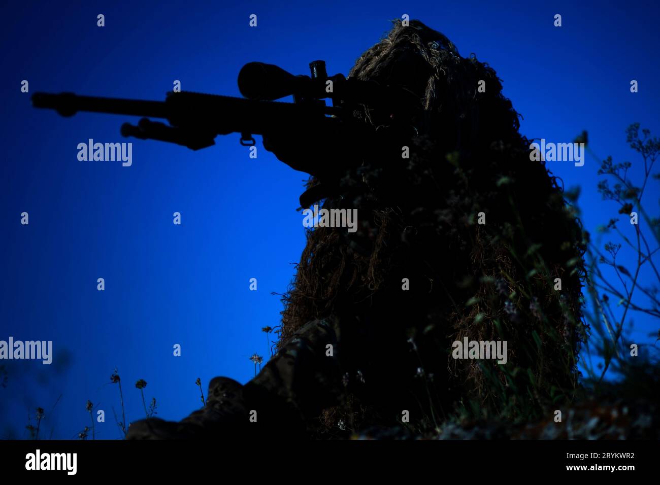 special operation forces sniper in ghillie (camouflage) suit with a ...